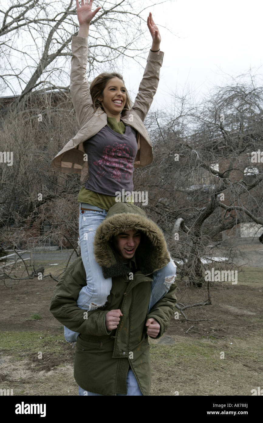 View of a man carrying a woman Stock Photo - Alamy