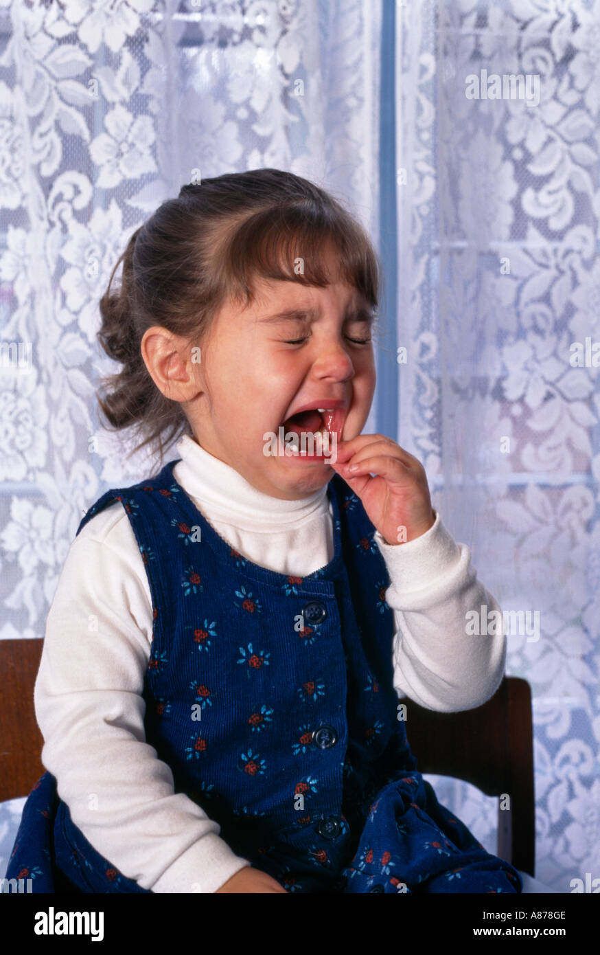 Young girl crying MR Stock Photo - Alamy