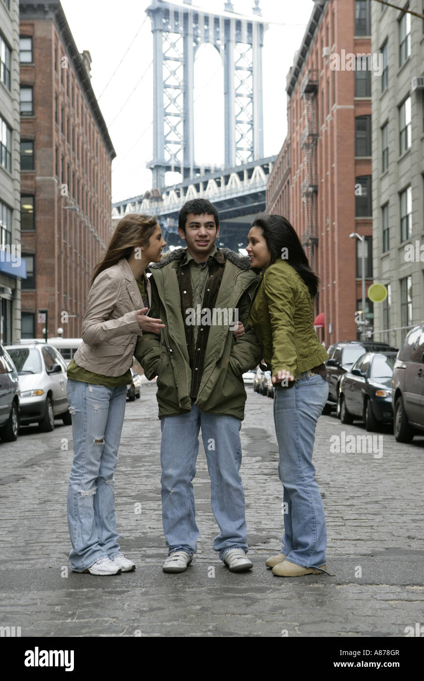 View of three friends happily Stock Photo - Alamy