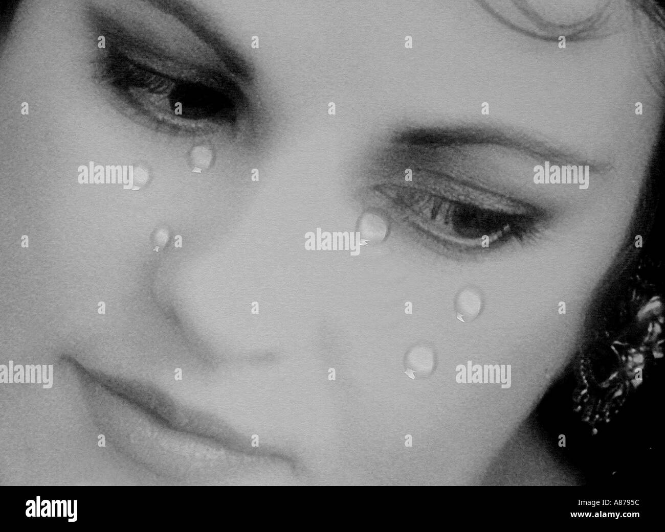 Portrait of woman with water droplets as tears Stock Photo - Alamy
