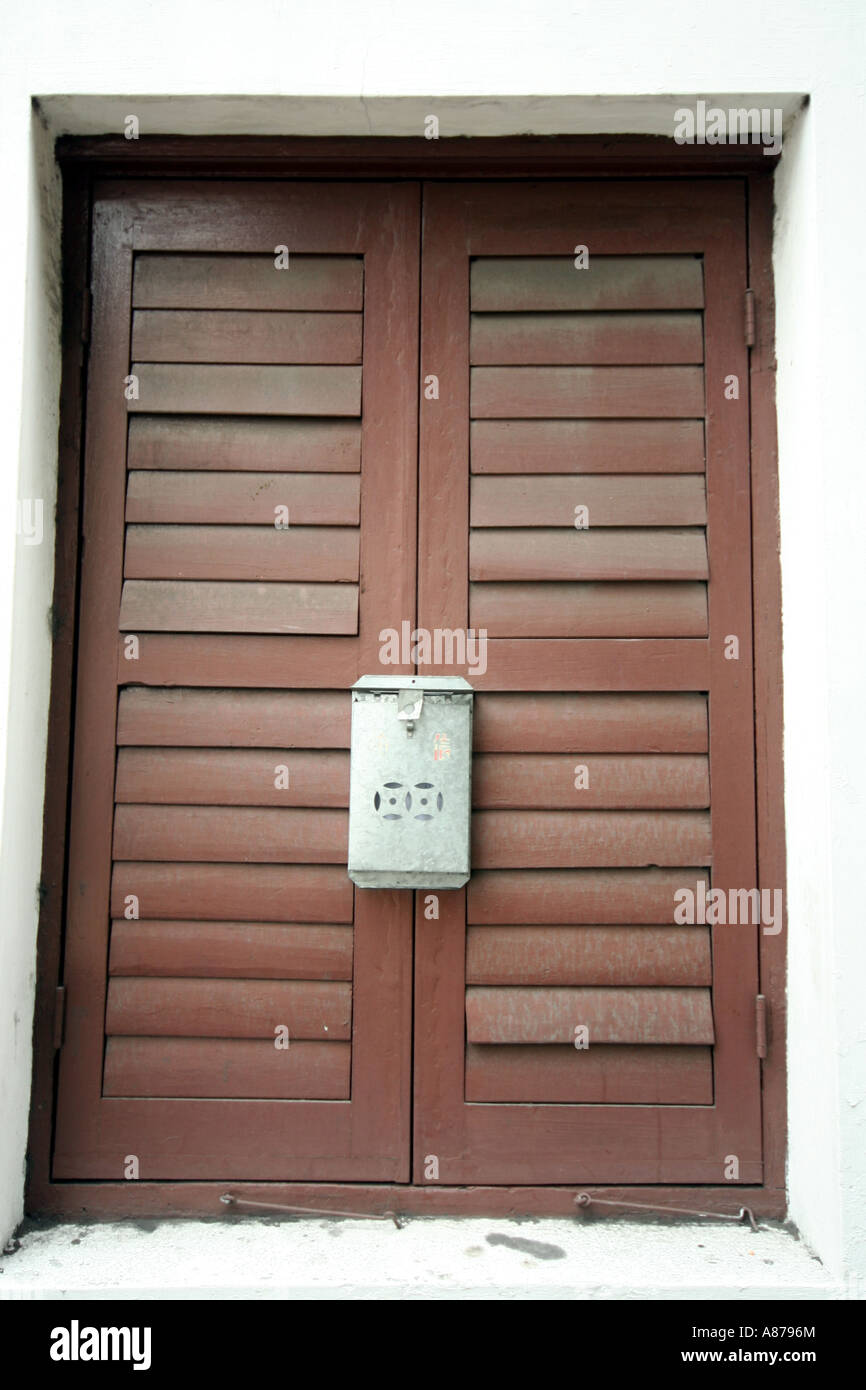 Letterbox on a wooden window Stock Photo - Alamy