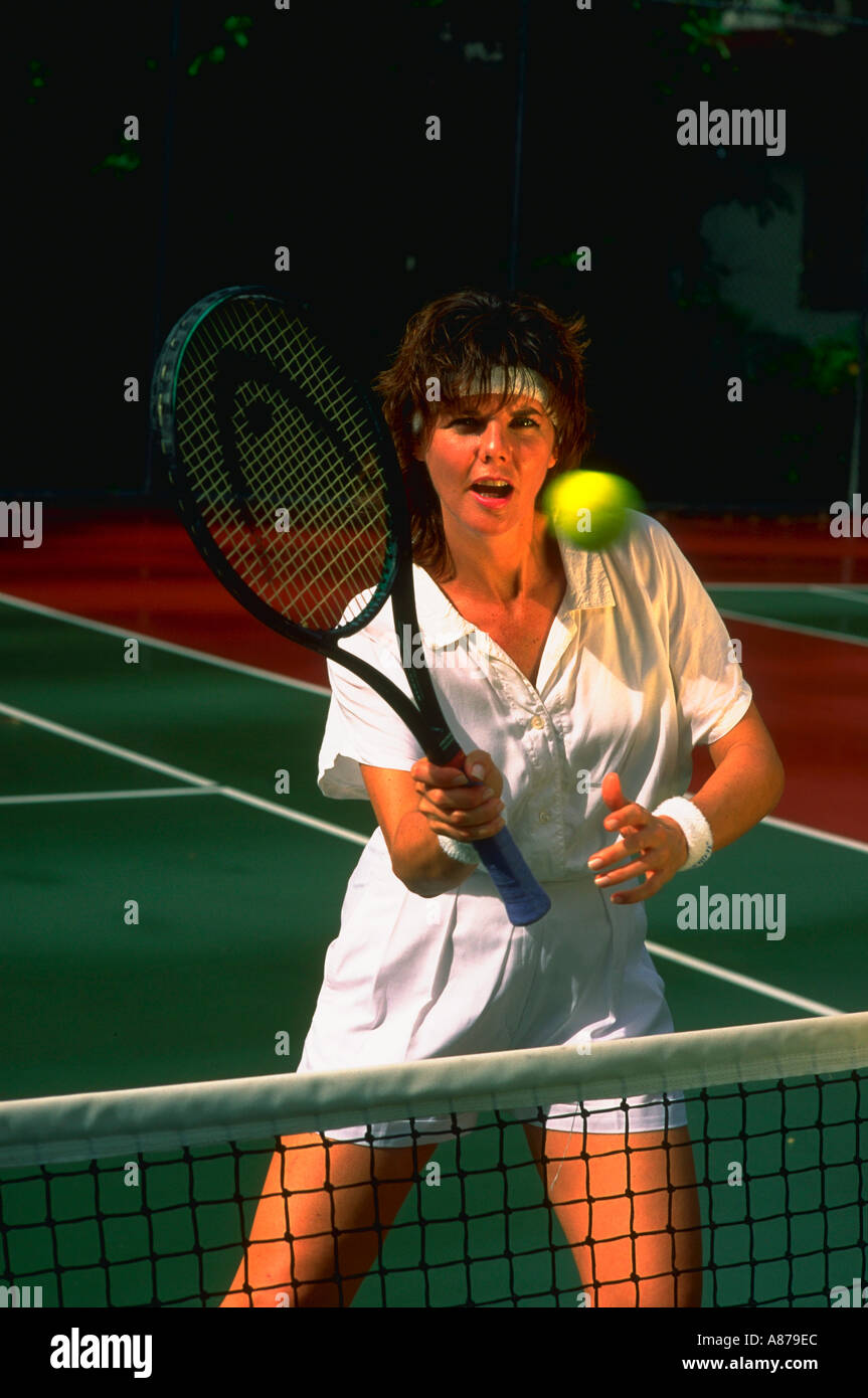 Female tennis hitting balls hi-res stock photography and images - Alamy