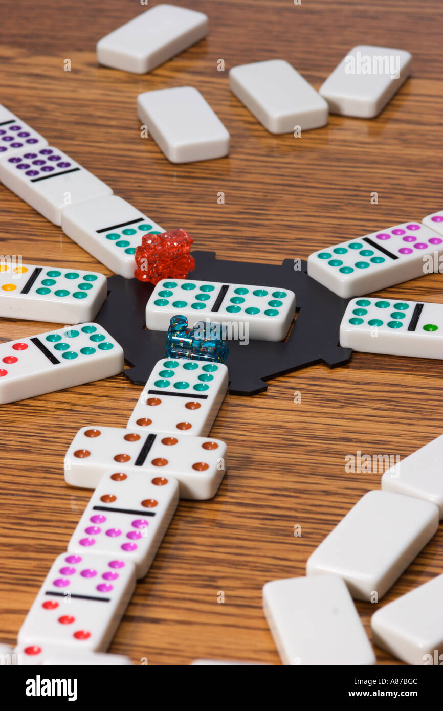 Mexican Train domino game played with brightly colored dominoes on a ...