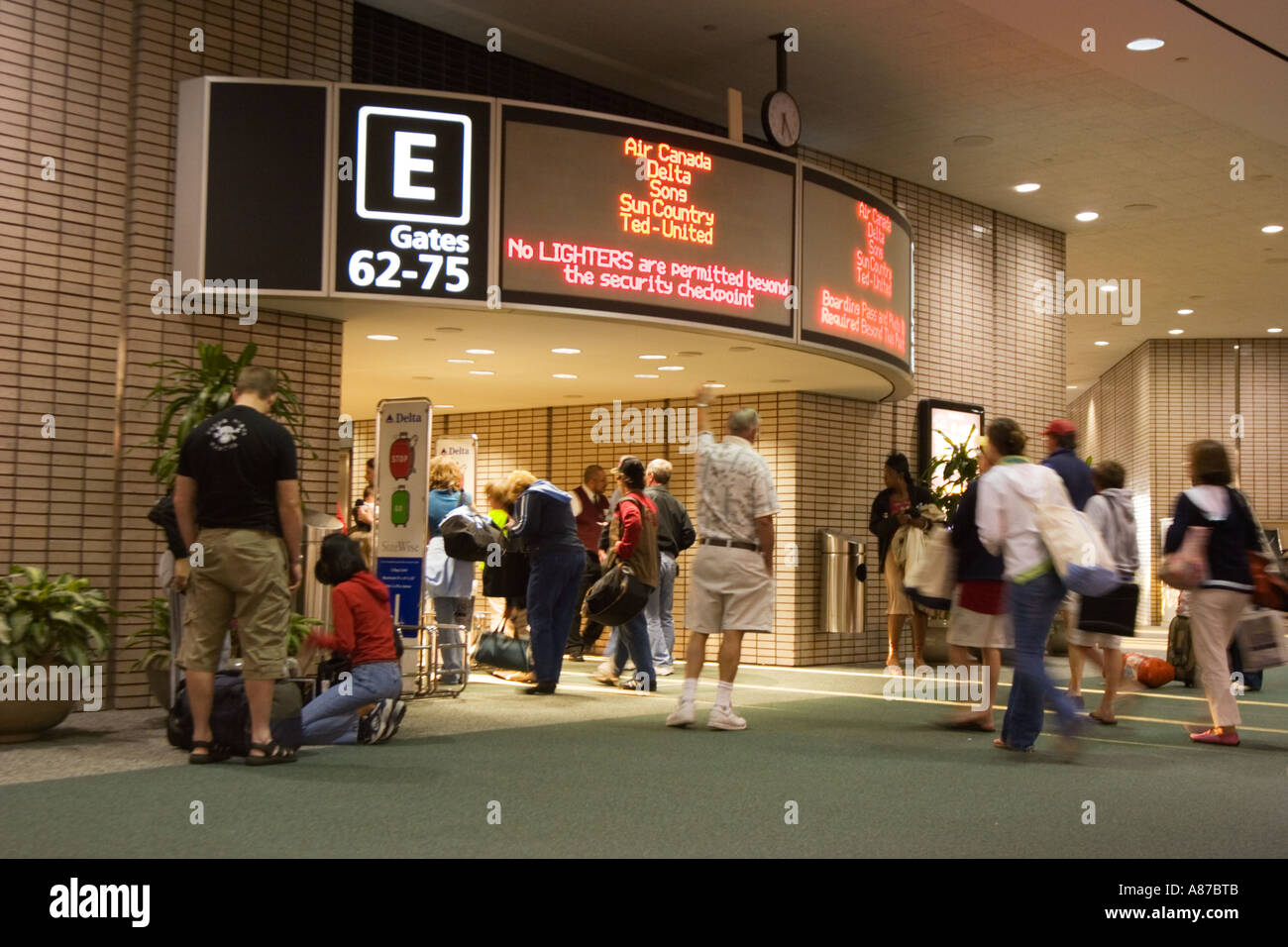 Passengers enter gate at Tampa International Airport, Florida, USA ...