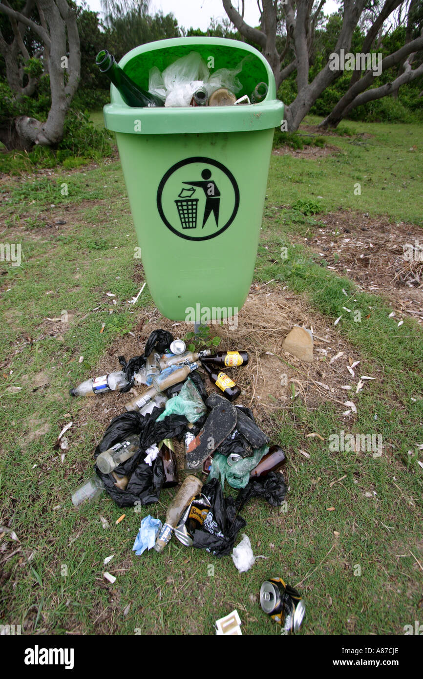 RUBBISH DUMPED IN FRONT OF A OVERFLOWING GARBAGE BIN VERTICAL BAPDB6263 ...