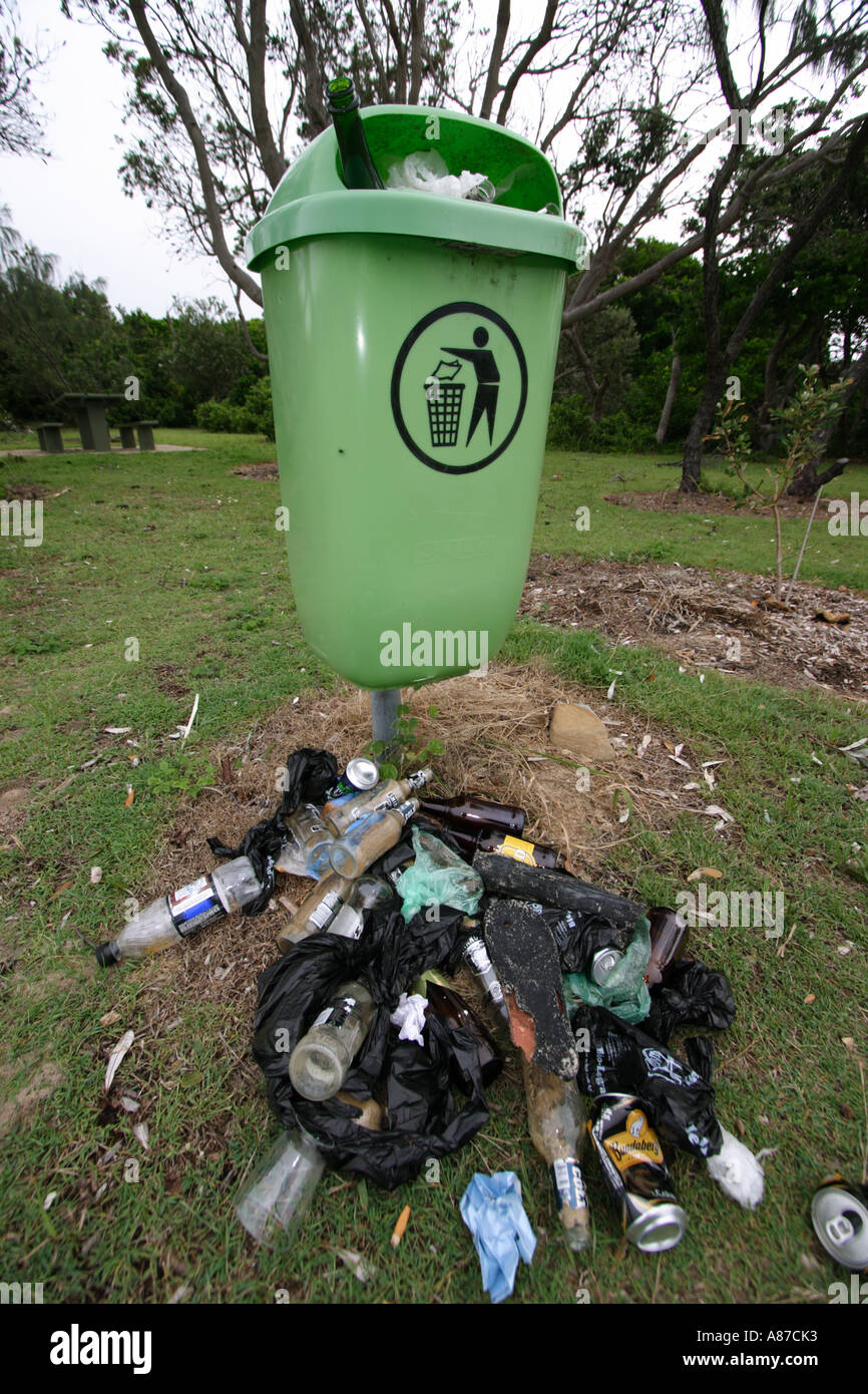 RUBBISH DUMPED IN FRONT OF A OVERFLOWING GARBAGE BIN VERTICAL BAPDB6264 ...