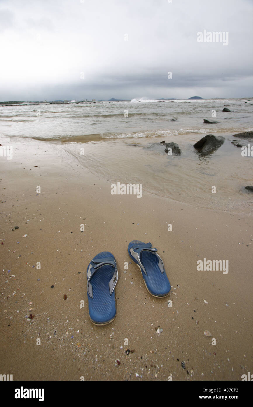 BLUE SANDALS ON DESERTED BEACH QUEENSLAND AUSTRALIA BAPDB6282 Stock ...