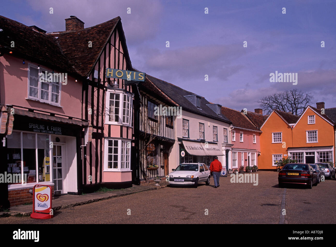 Timber framed buildings and village shops on the market square Lavenham ...