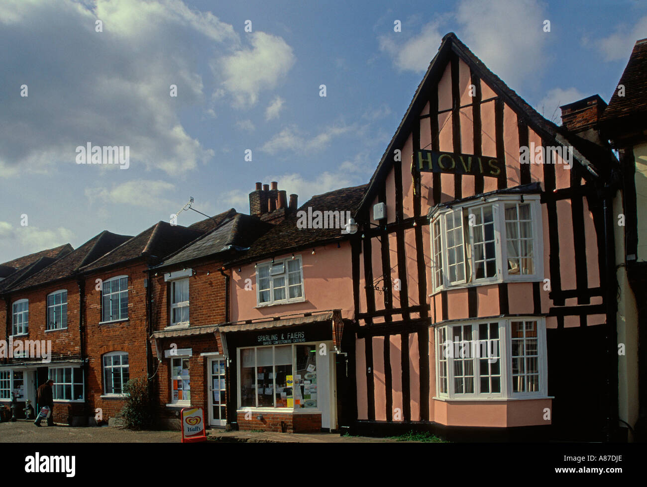 Timber framed buildings and village shops on the market square Lavenham ...