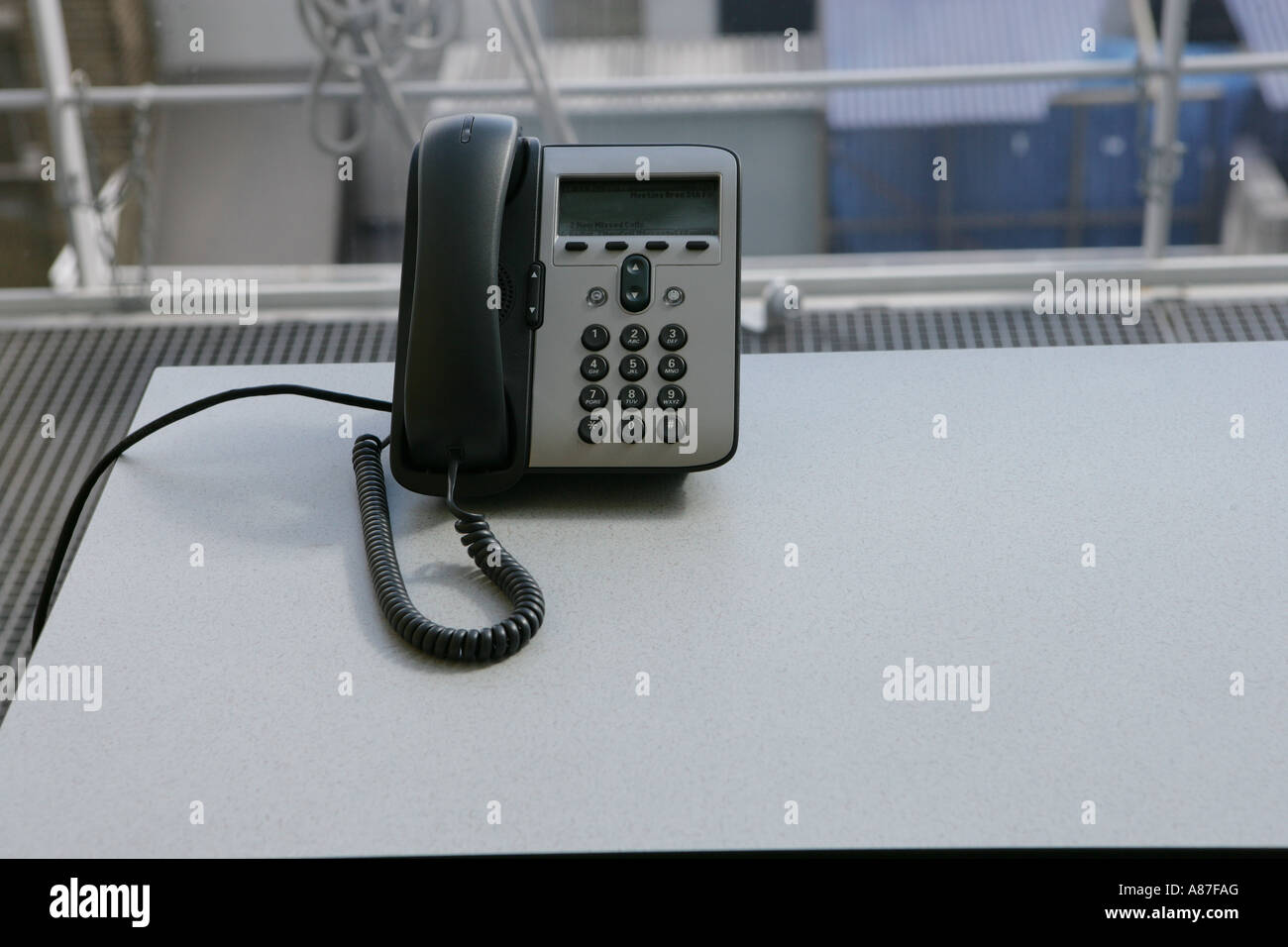 Telephone kept on desk Stock Photo - Alamy
