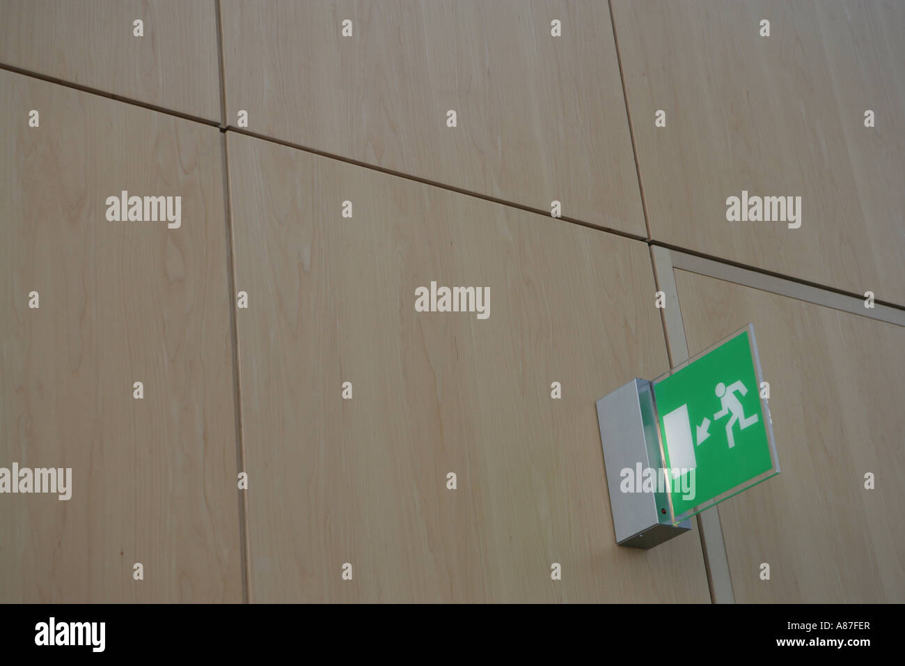 Signboard attached to wall Stock Photo - Alamy