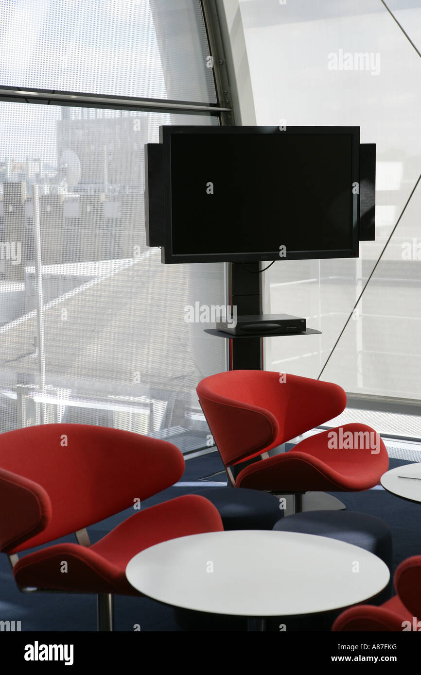 Television and red chairs Stock Photo - Alamy