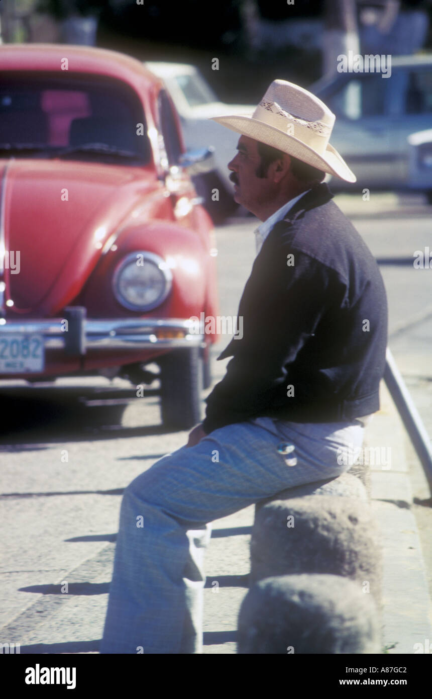 Man resting in the street at Puebla Mexico Stock Photo - Alamy