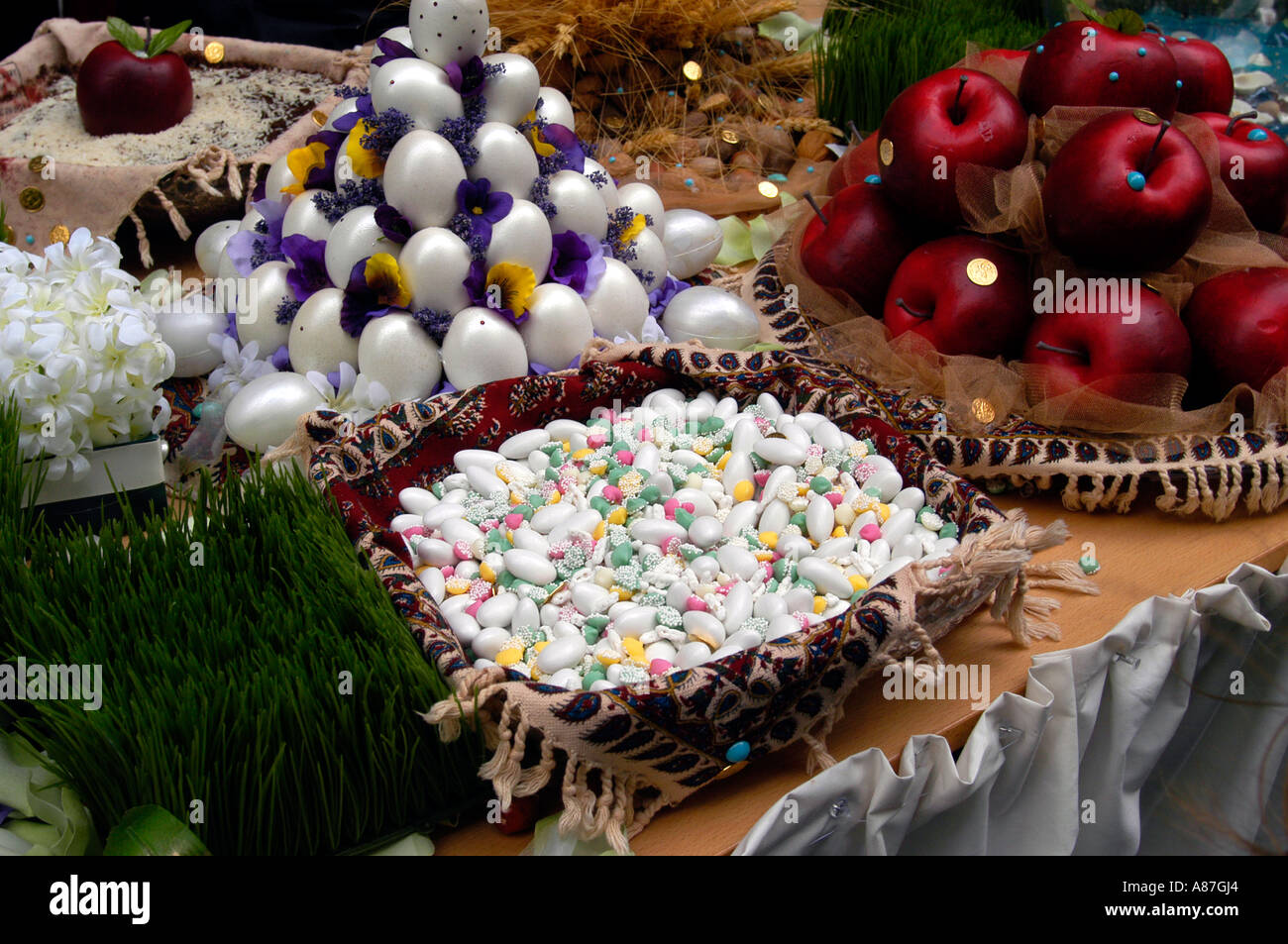 Table set with sweets fruits eggs etc representative of the Persian ...
