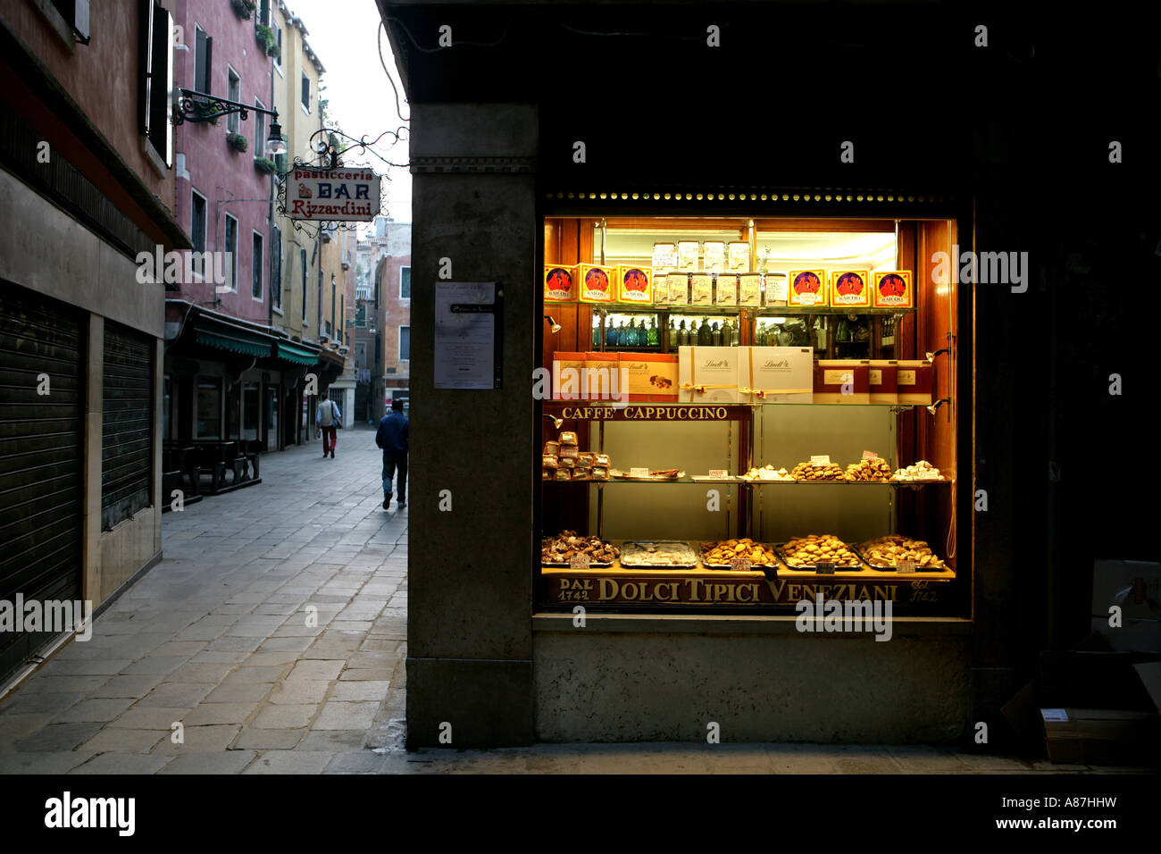 Window display of lit shop Stock Photo - Alamy
