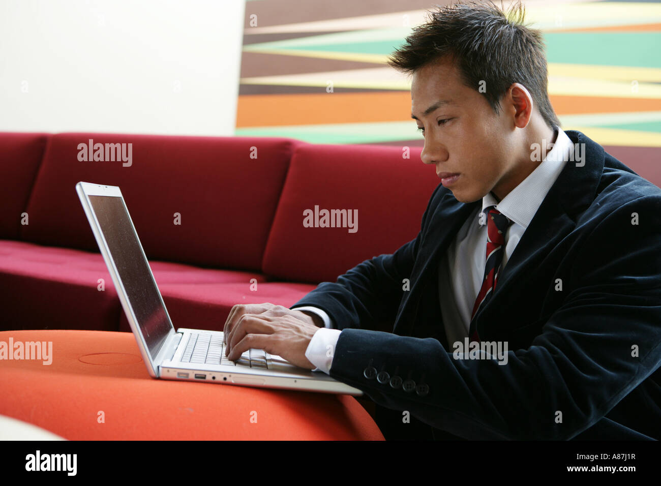 Side profile of a young businessman Stock Photo - Alamy