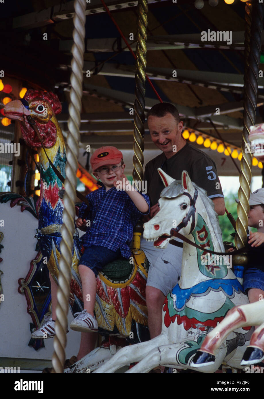 Boy on Carousel at Bressingham in Norfolk,Uk Stock Photo - Alamy