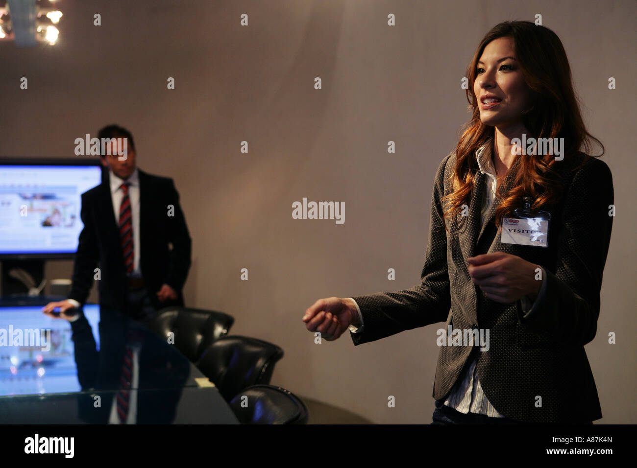 Two people in a conference room Stock Photo - Alamy
