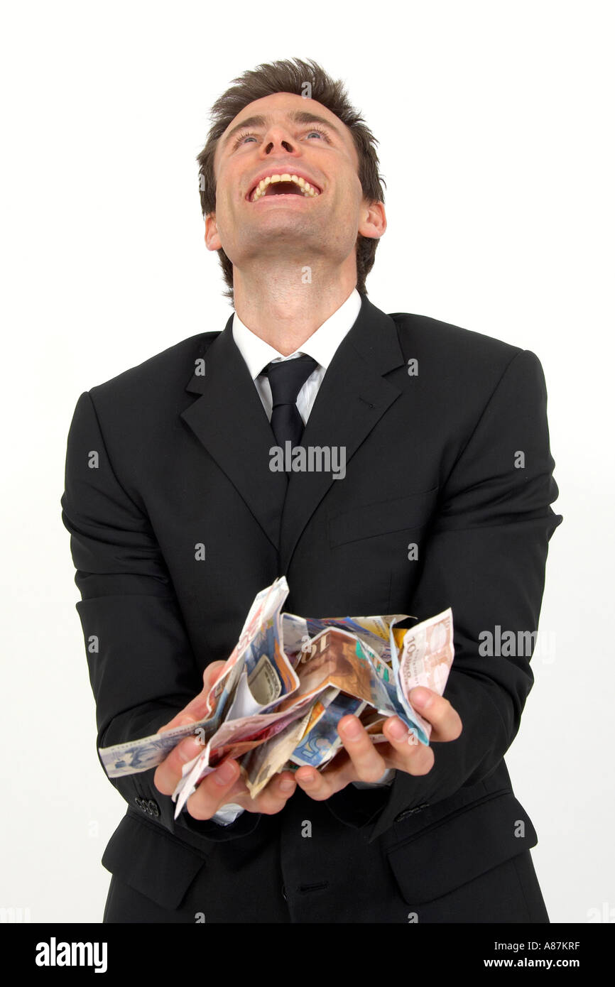 man with hands full of cash Stock Photo - Alamy
