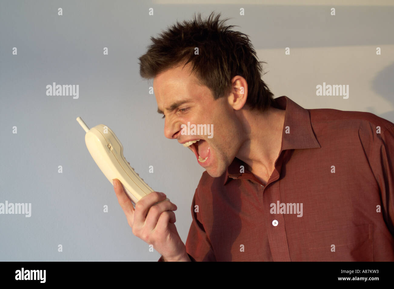 Cold calling angry hi-res stock photography and images - Alamy
