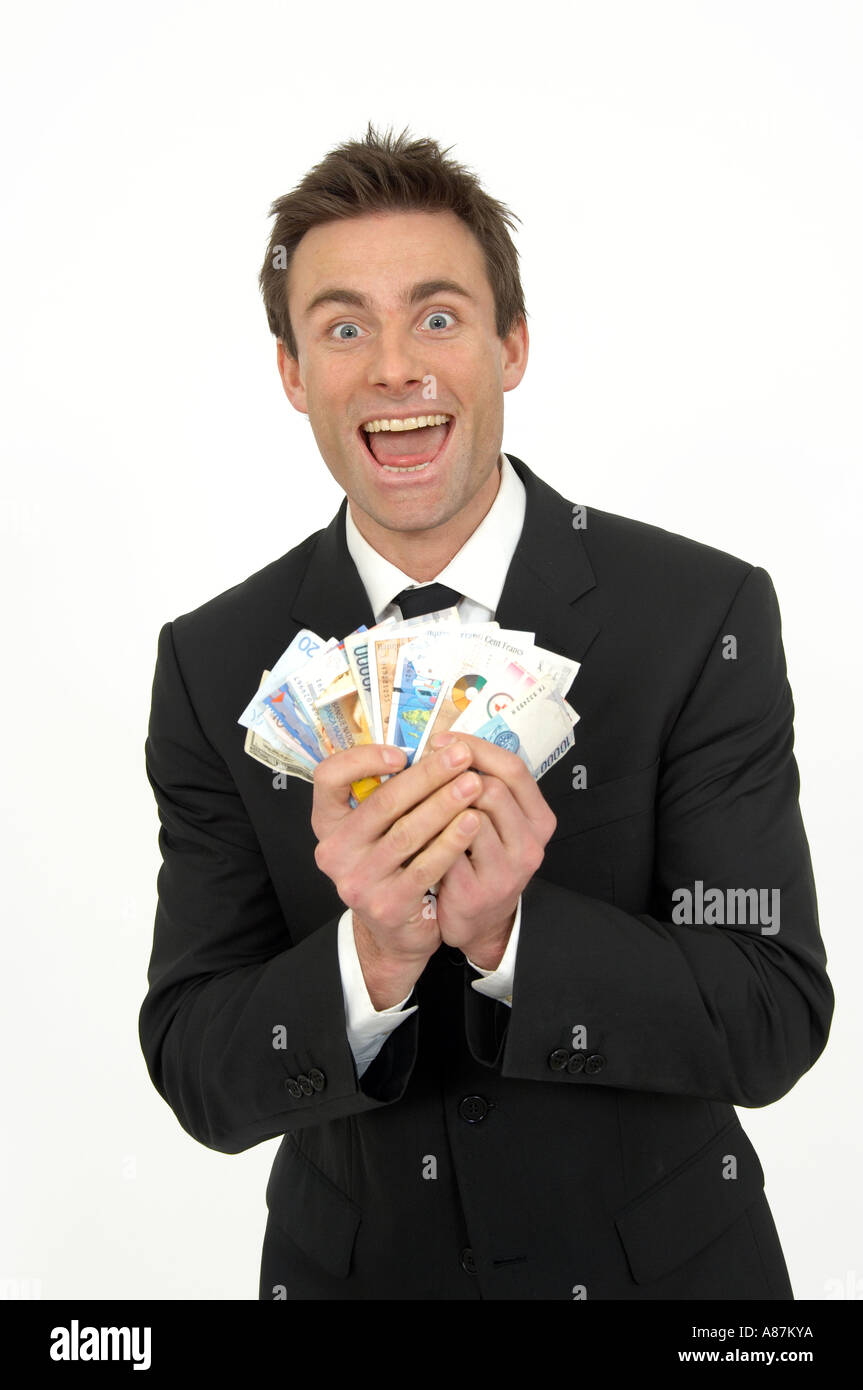 man with a bunch of notes in his hands excited winner Rob Wilkinson ...