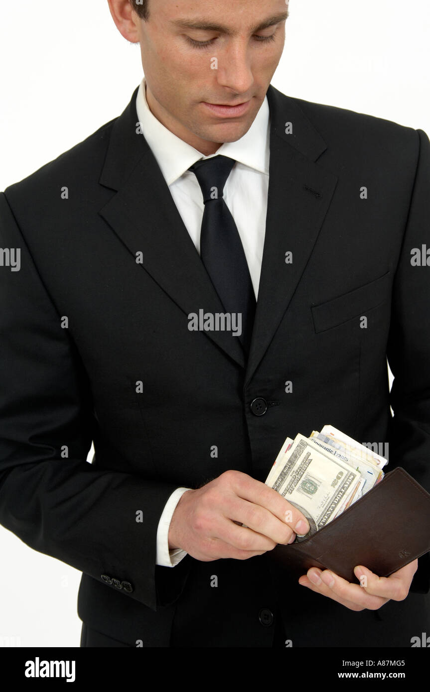 Taking money out hi-res stock photography and images - Alamy