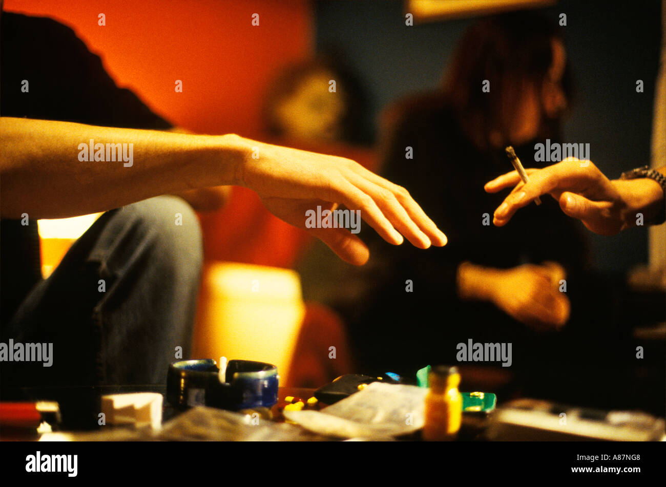 Passing a joint Stock Photo - Alamy
