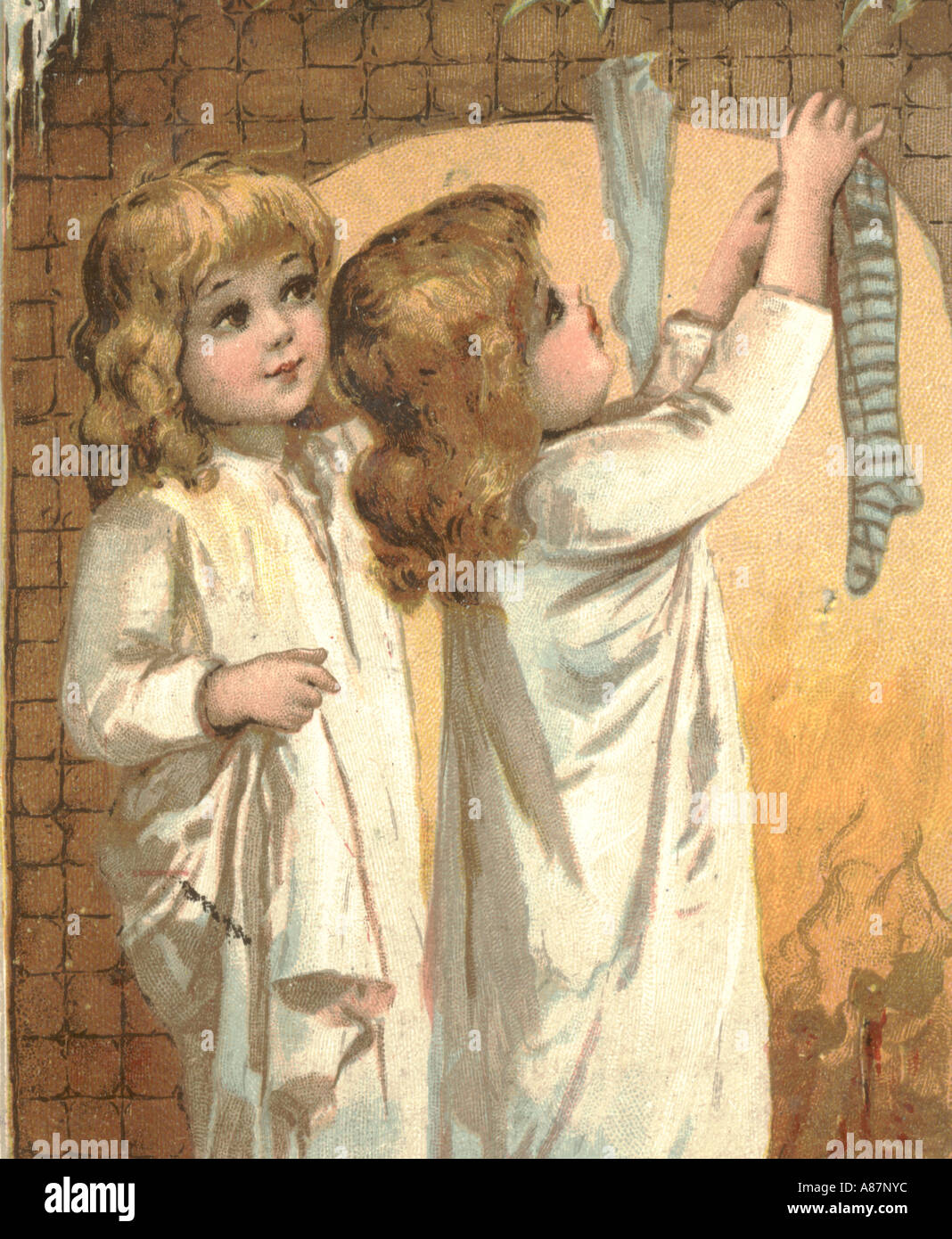 Children hanging up christmas stockings hi-res stock photography and ...