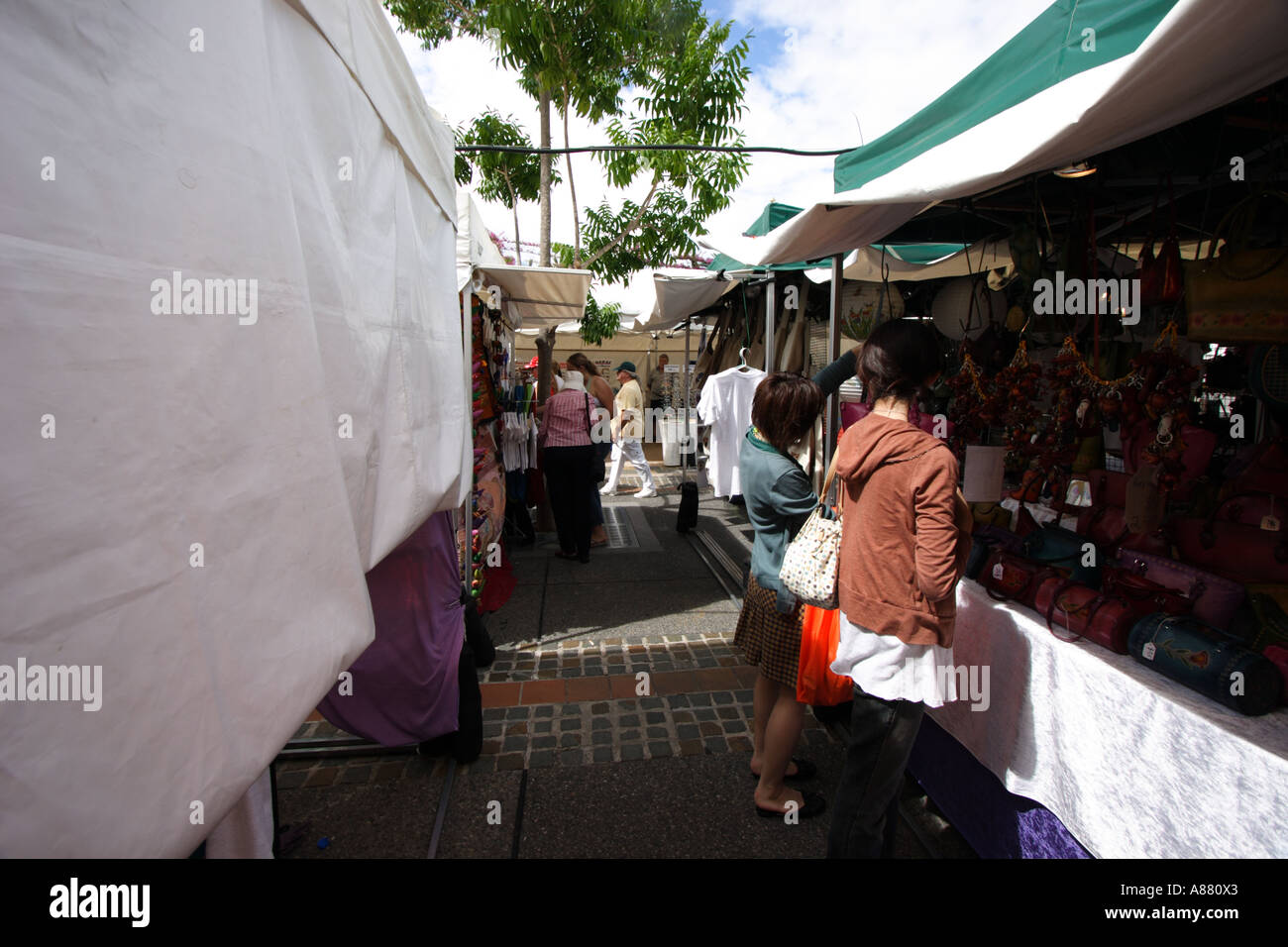 FLEA MARKET STALLS AND CUSTOMERS BAPDB6625 Stock Photo - Alamy