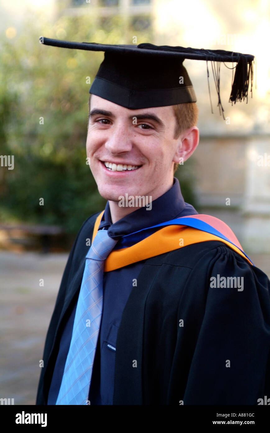 young new male graduate Stock Photo - Alamy