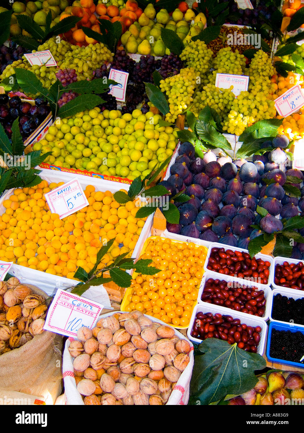 Food display stand containing colorful fruits and vegetables Stock ...