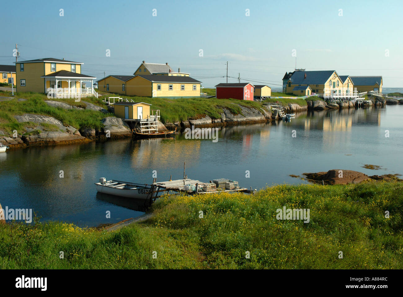 ocean inlet by homes Stock Photo - Alamy