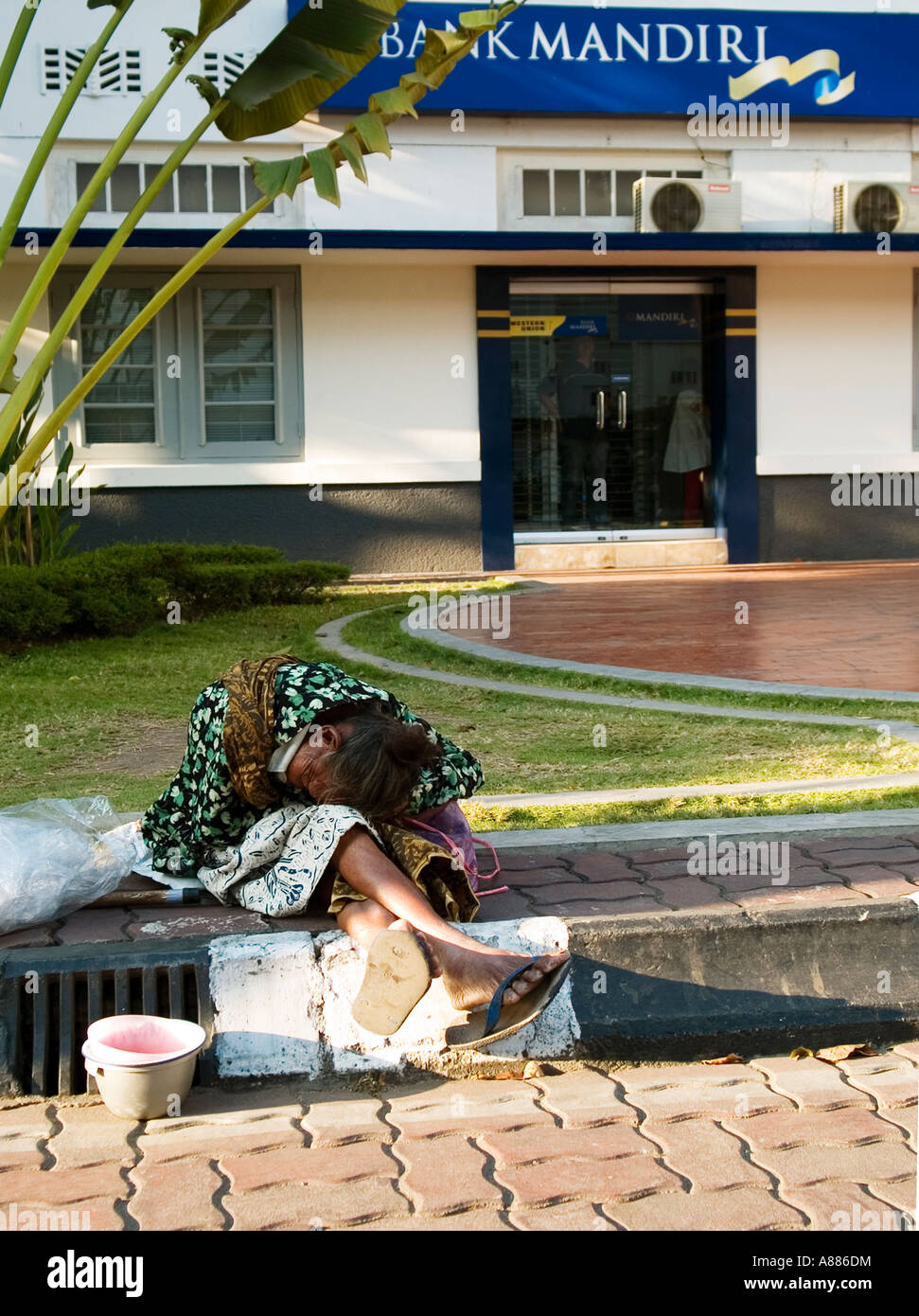 Woman begging in the street hi-res stock photography and images - Alamy