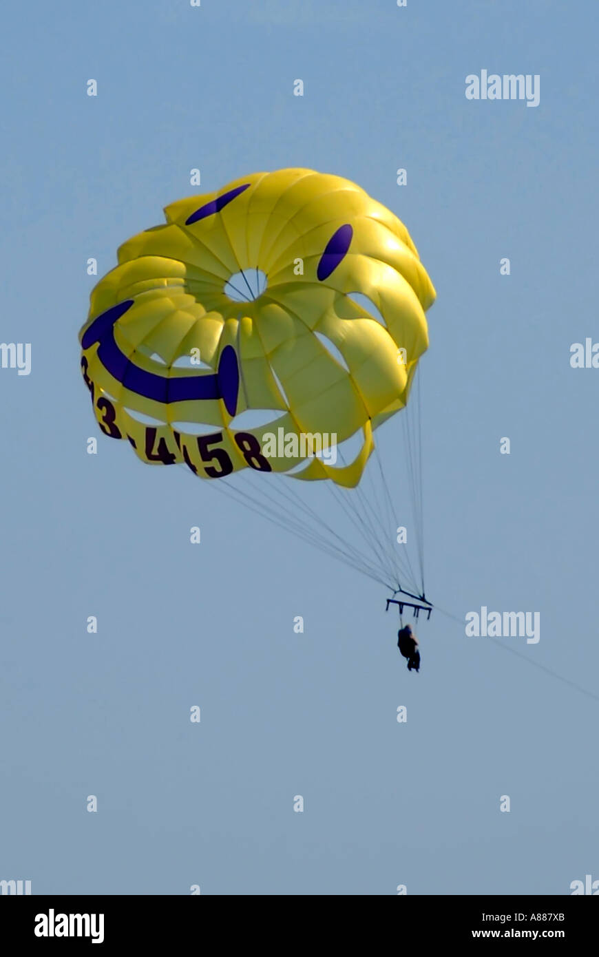 Parasail parachute over the ocean waters of Daytona Beach Florida FL ...
