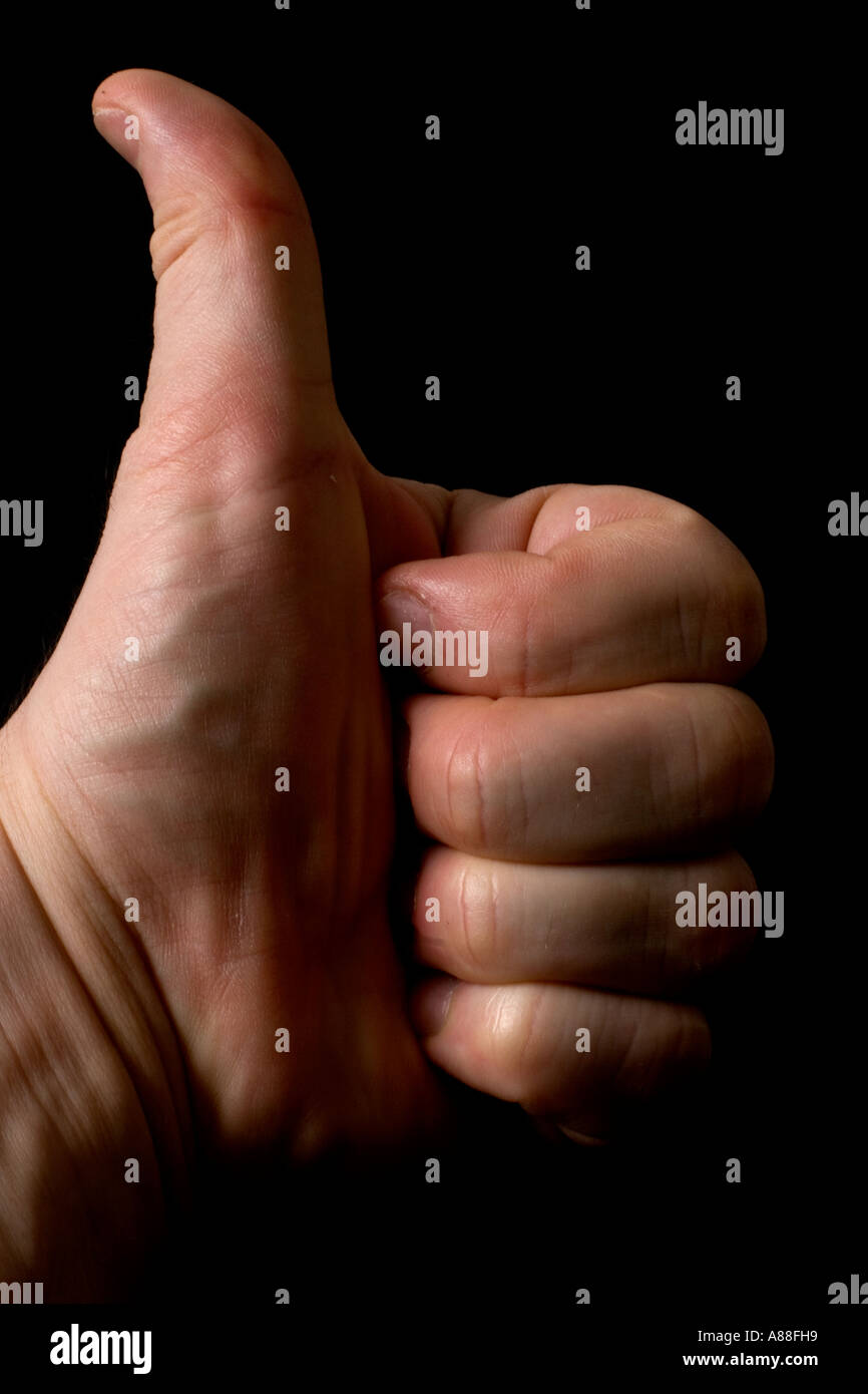 hand with raised thumb giving OK sign Stock Photo - Alamy