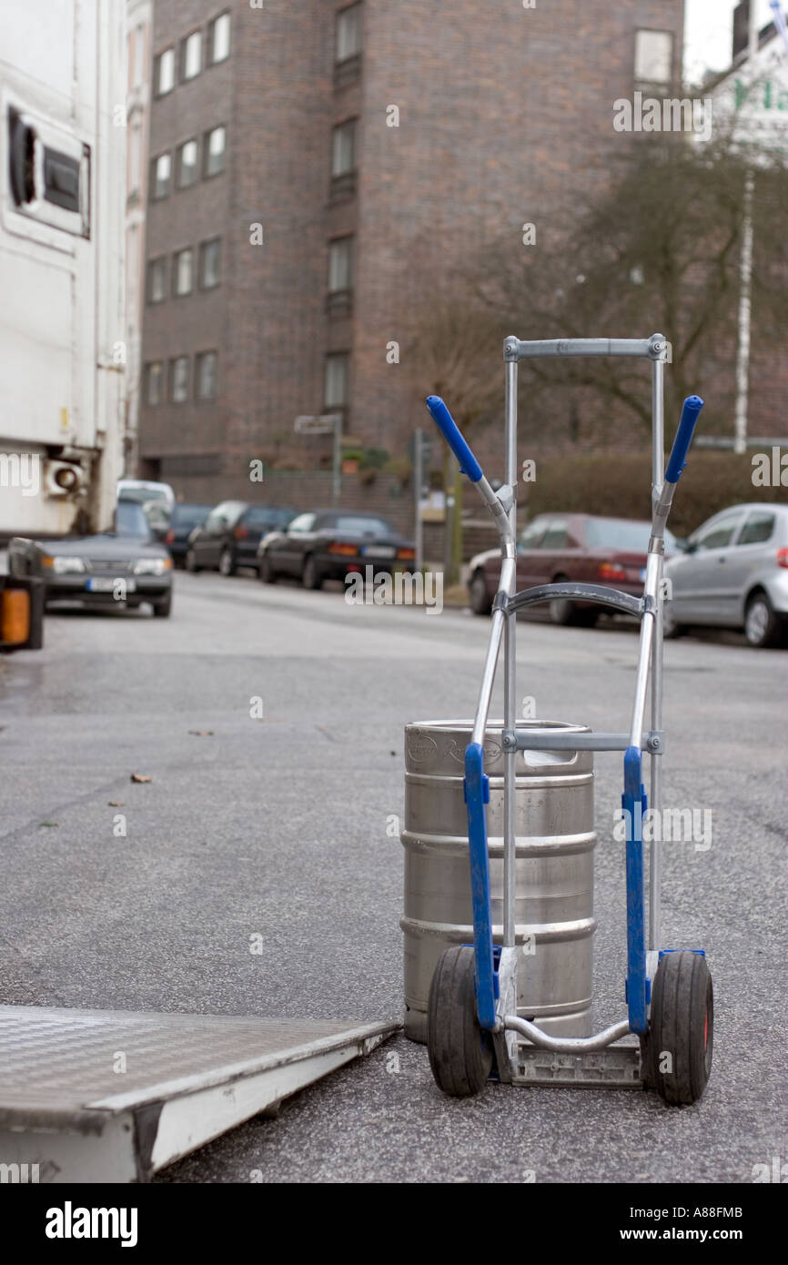 Hand barrow and a beer keg on the street Stock Photo - Alamy