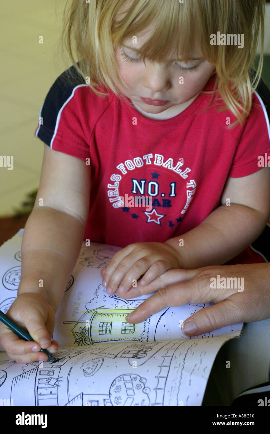 Young child drawing as part of early development Stock Photo - Alamy