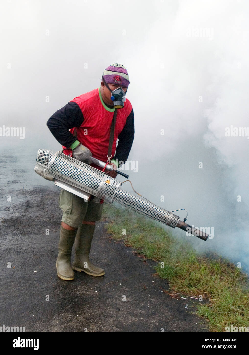 fogging in a small village to eradicate mosquitoes near denpasar bali ...