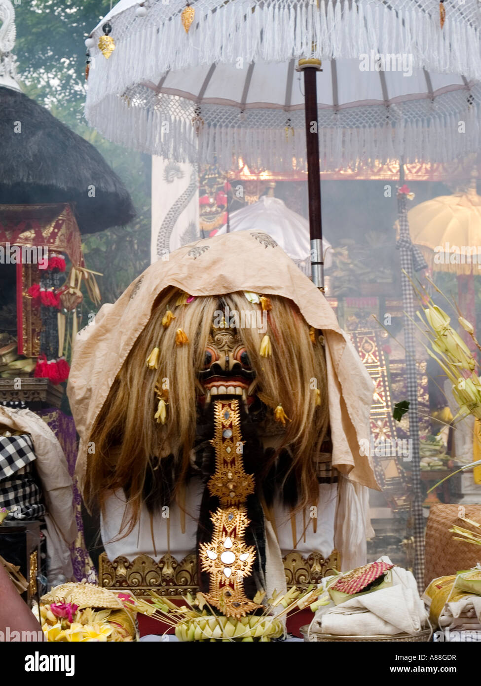 Balinese mask on temple alter at private non tourist ceromony hi-res ...