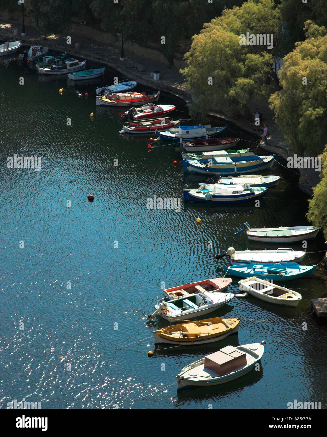 View of boats at Ayios Nikolaos, Crete ("bottomless lake Stock Photo ...