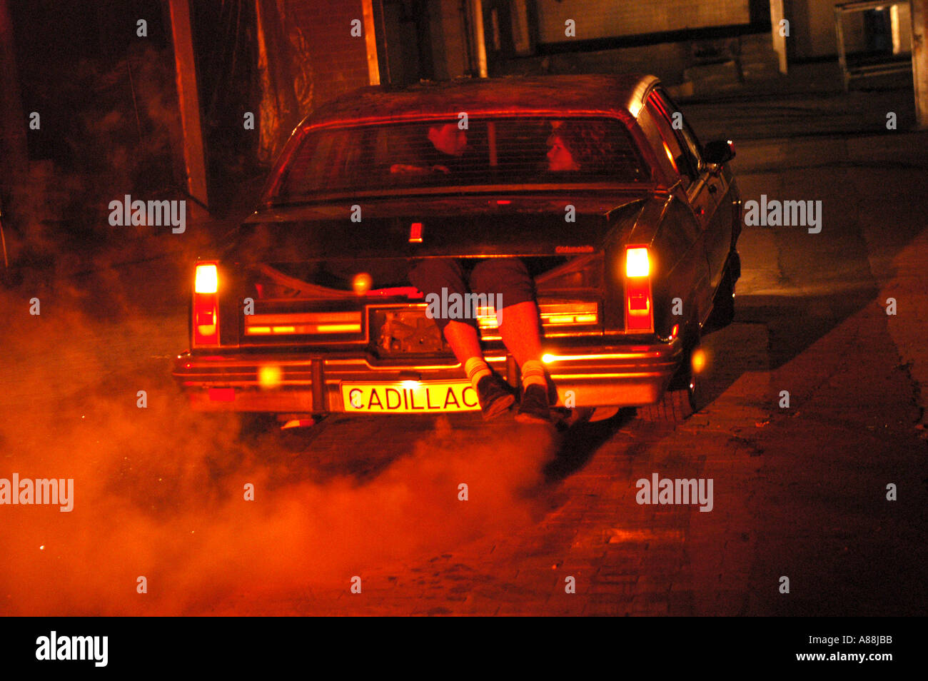 A Cadillac car in dark garage Stock Photo - Alamy