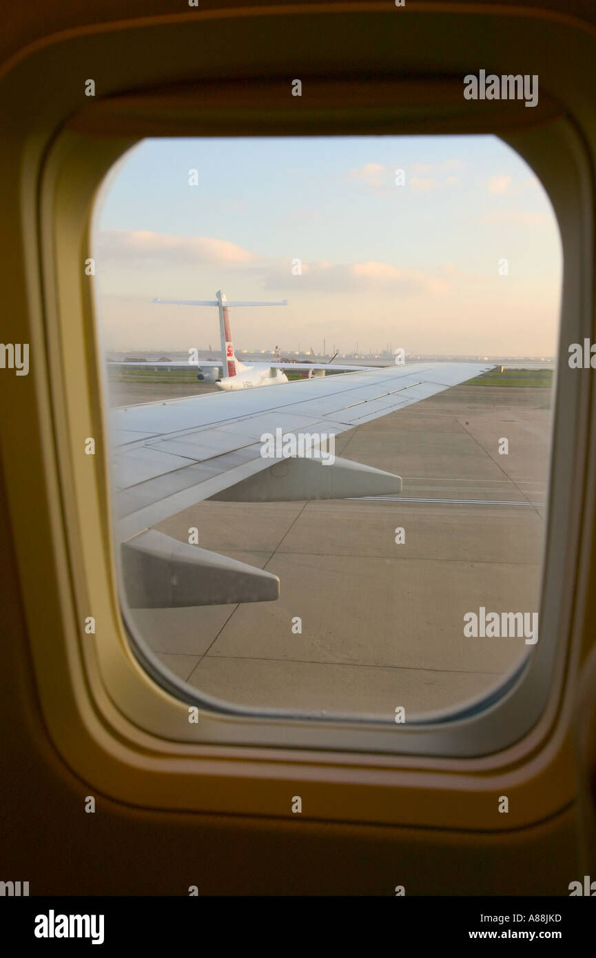 a Ryanair, Boeing 737-500 passenger Jet, looking out the window prior ...