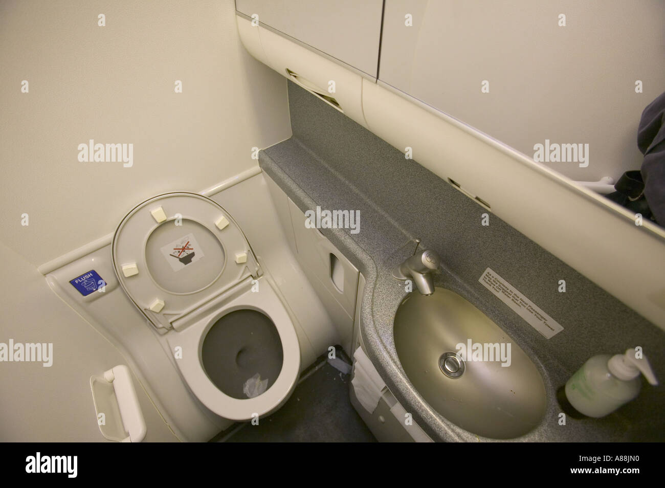 Plane toilet hi-res stock photography and images - Alamy