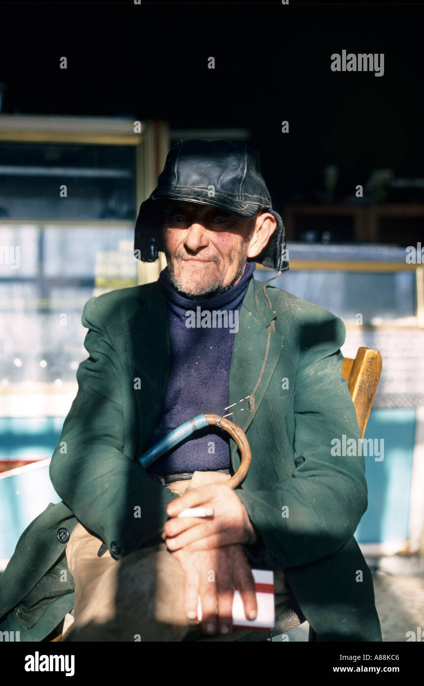 greece greek faces portrait of an old man seated outside a cafeneon in ...