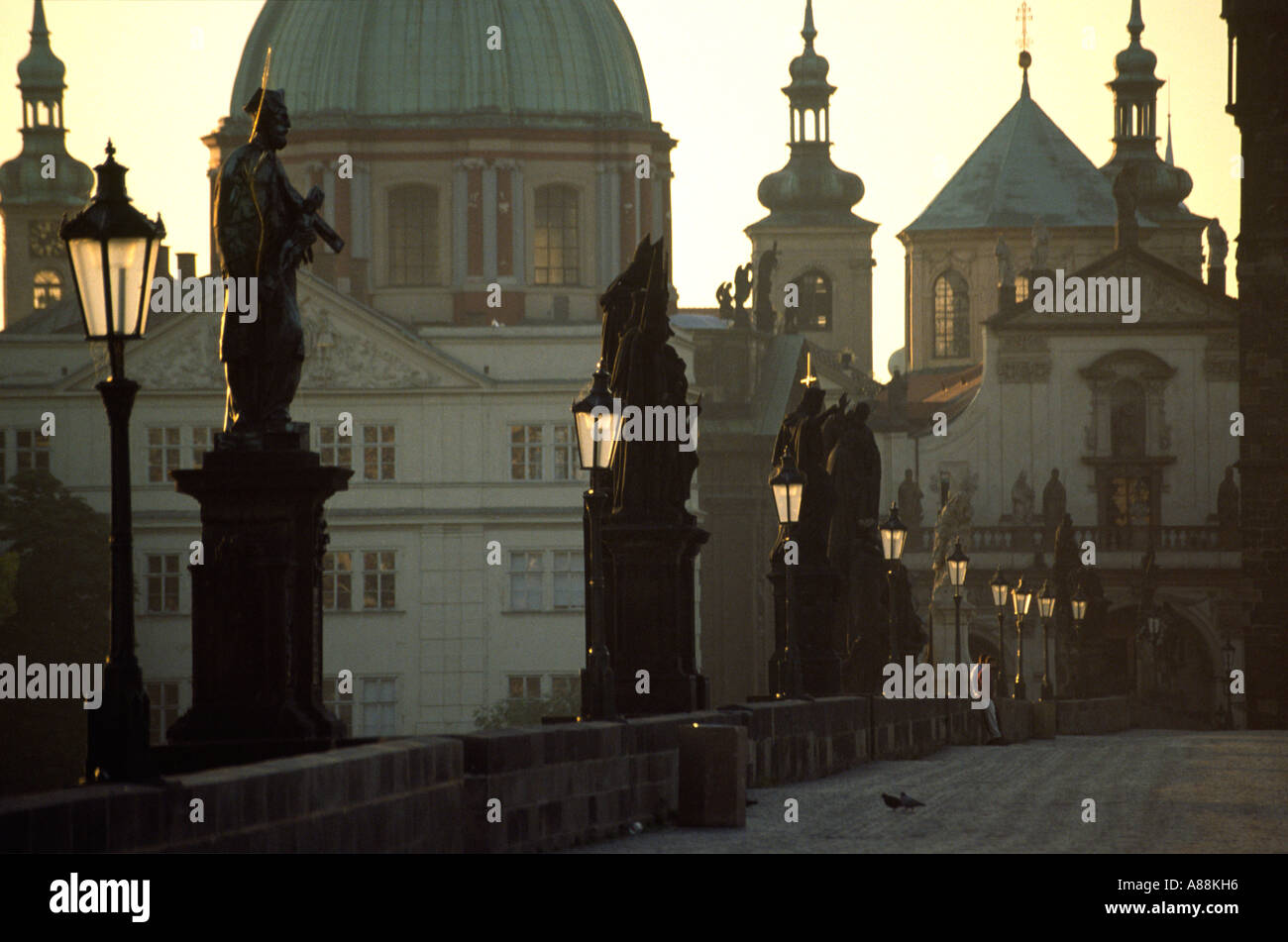 Horizontal landscape detail of dawn statues of Charles Bridge, Prague ...