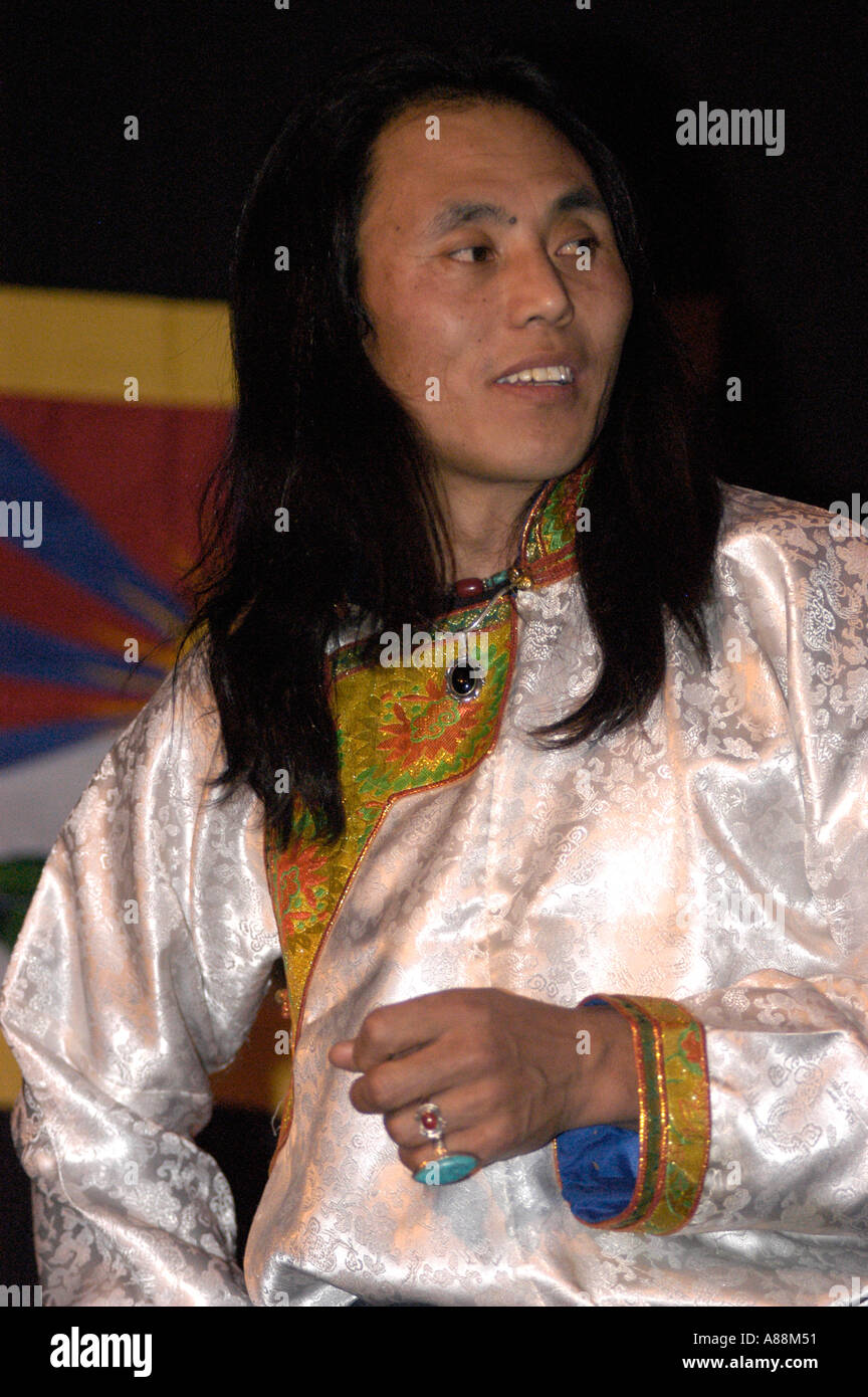 Tibetan singer from Snow Lion music band in traditional clothes Stock ...