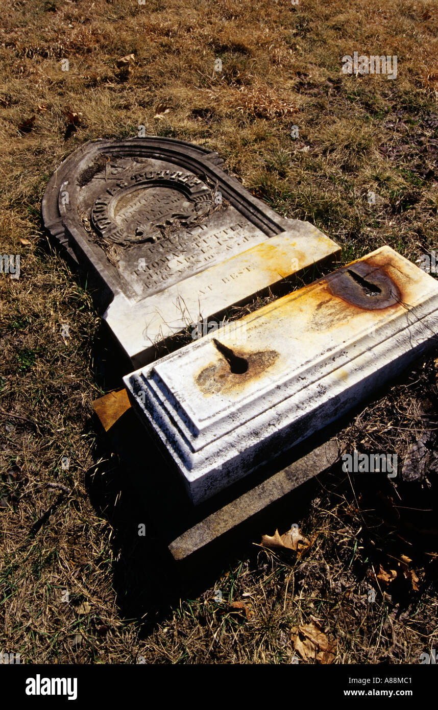 Broken Headstone in a New England graveyard USA vertical Stock Photo ...