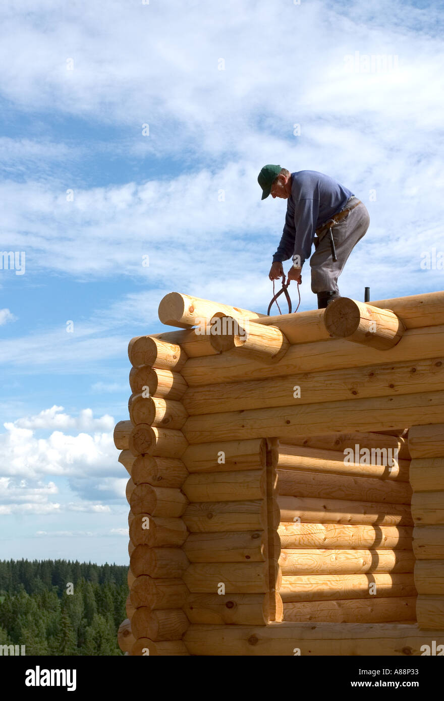 Man standing on roof beam hi-res stock photography and images - Alamy