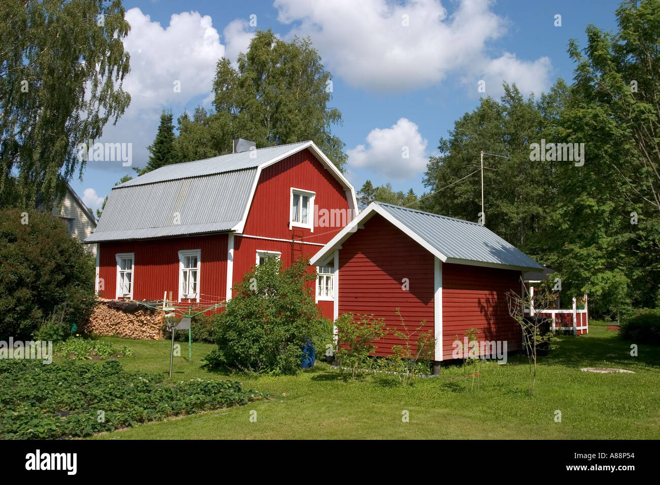 Old-fashioned Finnish red wooden house and garden , Finland Stock Photo ...
