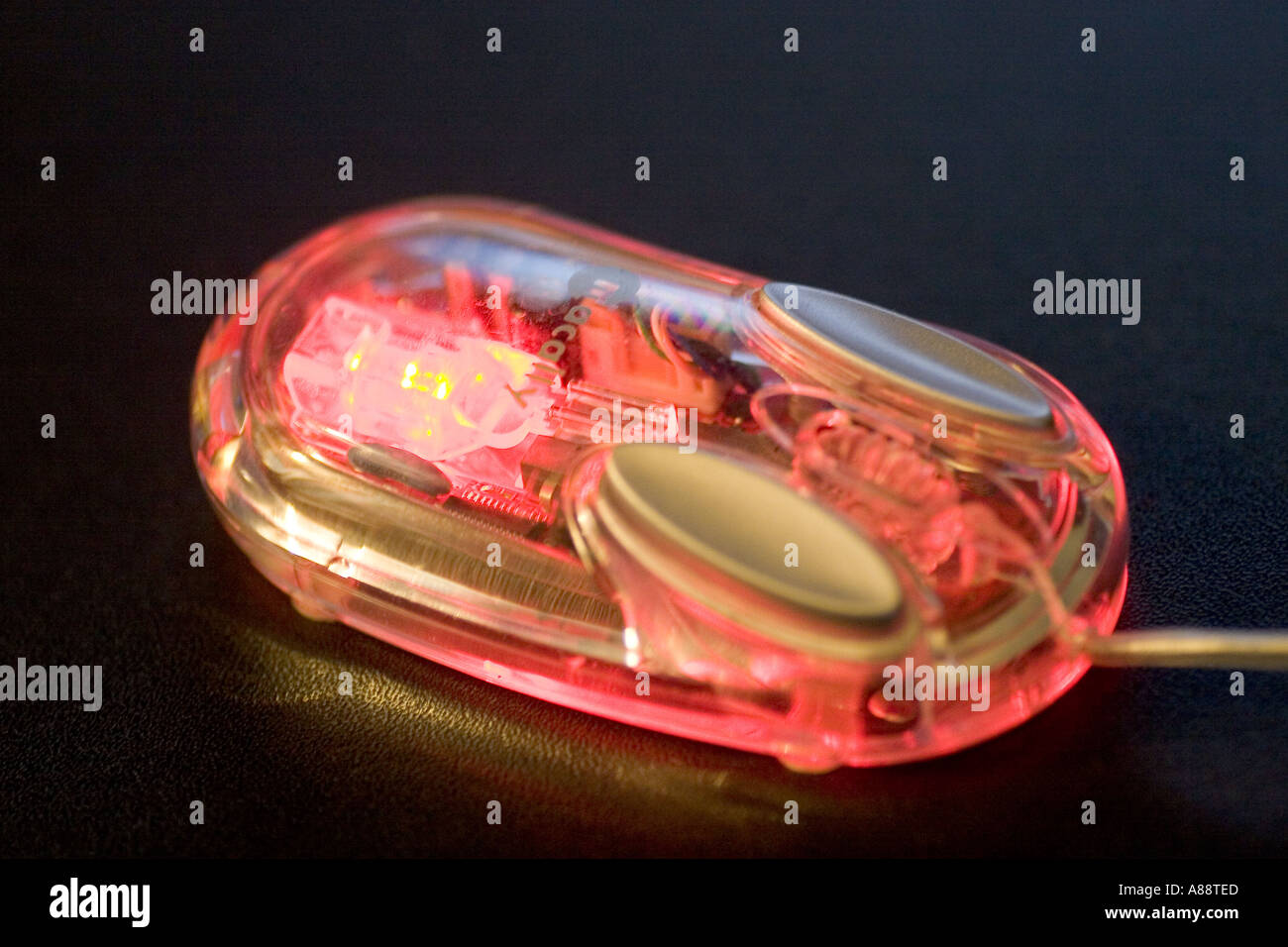 Illuminated computer mouse Stock Photo - Alamy